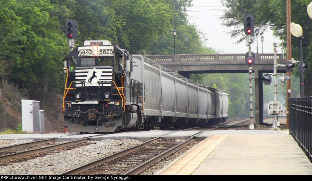 NS: short local freight train passing the AMTRAK Station